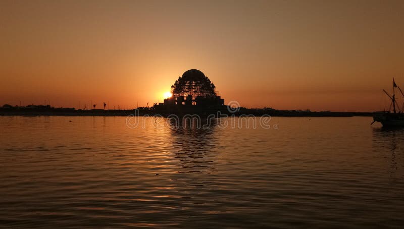 Sunset in the Ocean Behind the Mosque Stock Image - Image of skyline ...