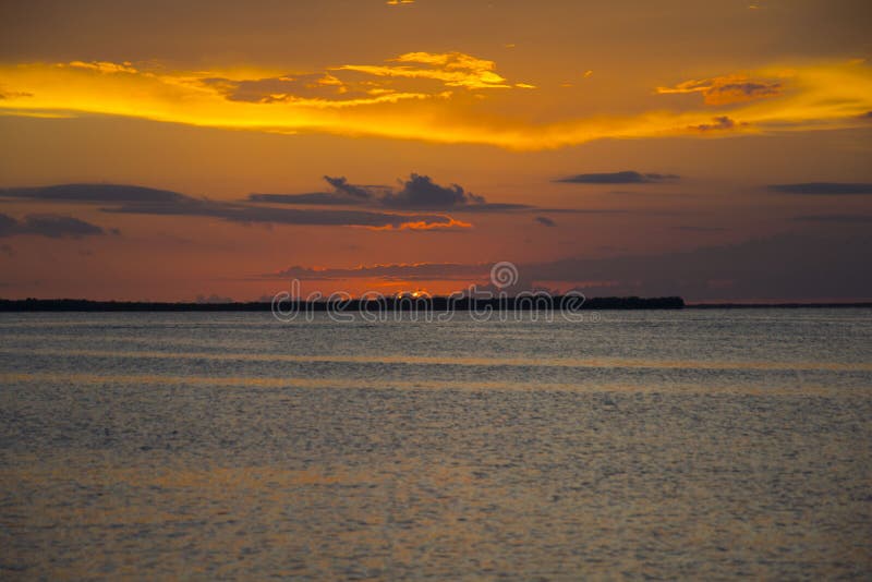 Sunset at the ocean stock photo. Image of ocean, tranquil - 77092048