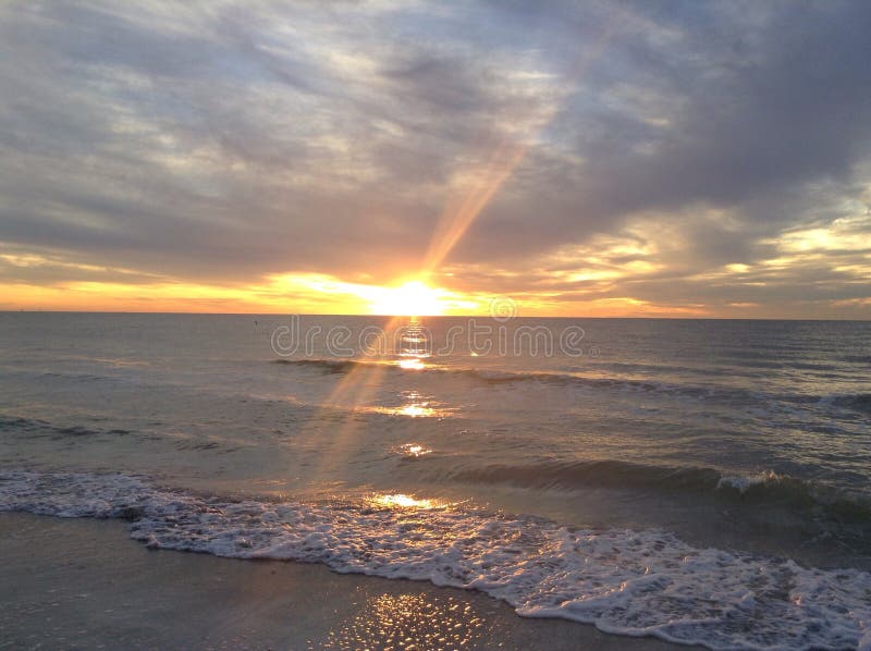 Sunset on the ocean stock photo. Image of sunset, ocean - 53486248