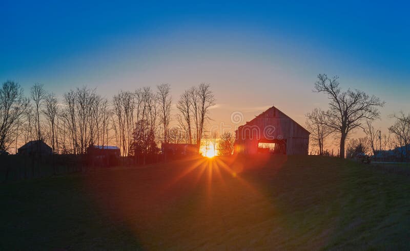 Sunset with Old Barn stock photo. Image of spring, rust - 140718890