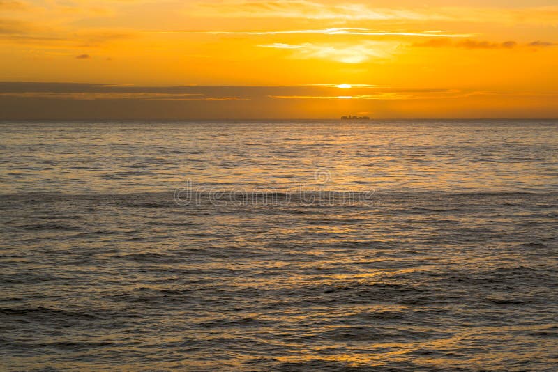 Sunset in the open ocean. stock image. Image of beauty - 74909397