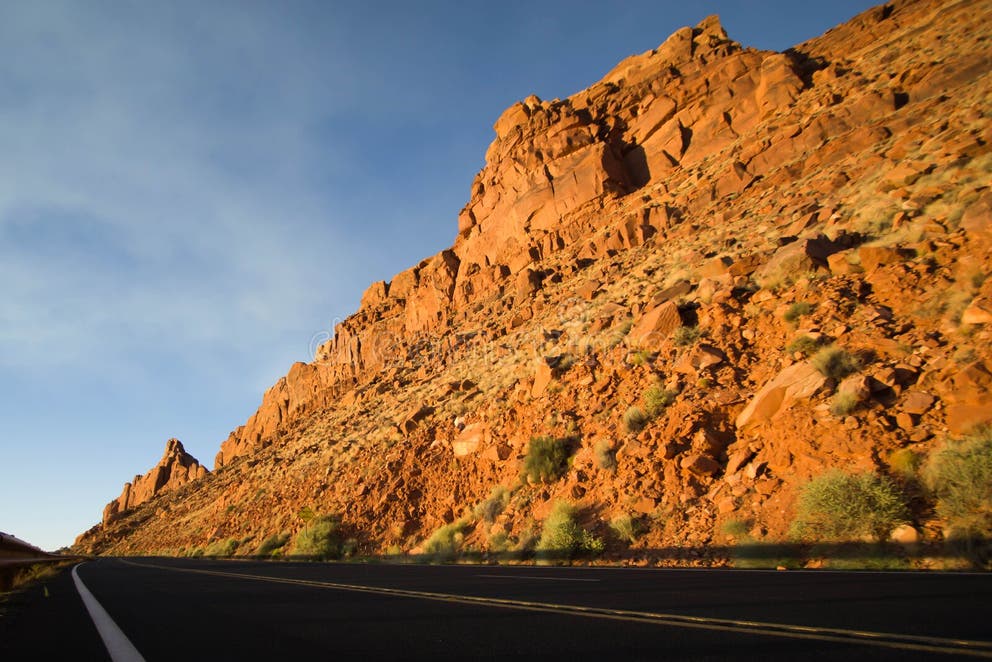 Sunset on the open road stock image. Image of mountains - 76902807