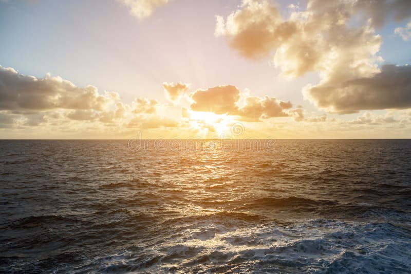 Sunset in the open sea. stock photo. Image of color, cloud - 74829860