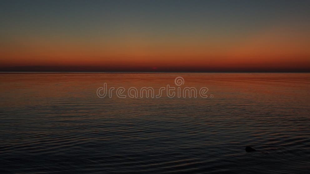 Landscape sea after sunset stock image. Image of sunset - 46062135