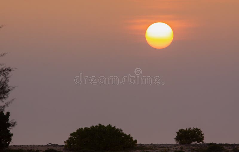 Round Red Sun in the Evening. Stock Photo - Image of light, evening ...