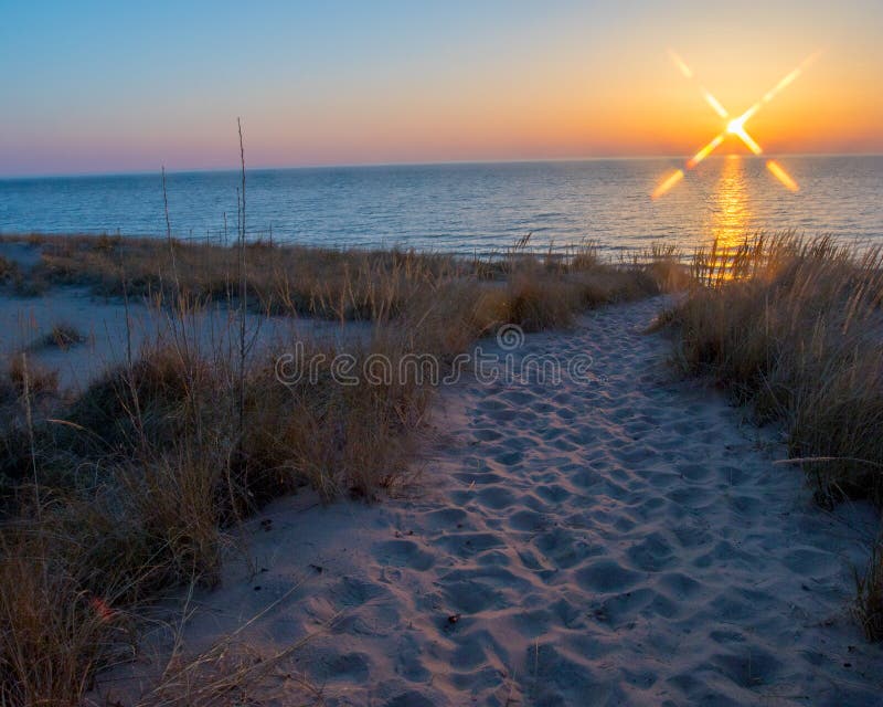 Sunset on an oval lake stock photo. Image of natural, beautiful - 5444902