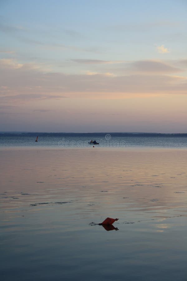 The sunset over the bay stock image. Image of night, sunset - 62471801