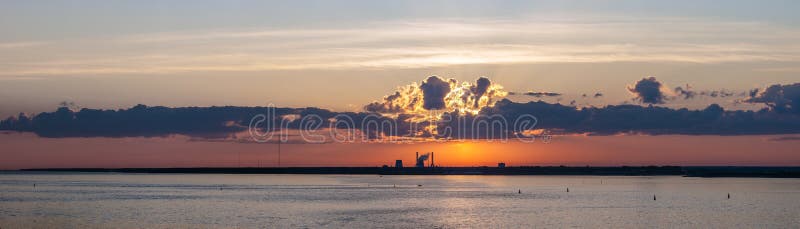 Sunset over the bay stock image. Image of dark, serene - 95601089