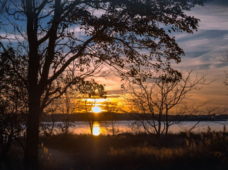 Sun setting over the beach stock photo. Image of minsk - 134011142