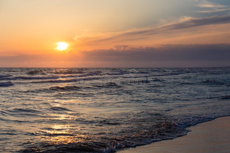Sunset Over Beach Sea Tide Sand Coast Seashore Stock Photo - Image of ...
