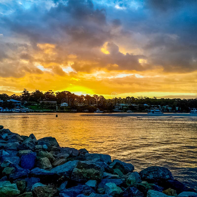 Sunset over beach stock photo. Image of morning, beach - 224870988