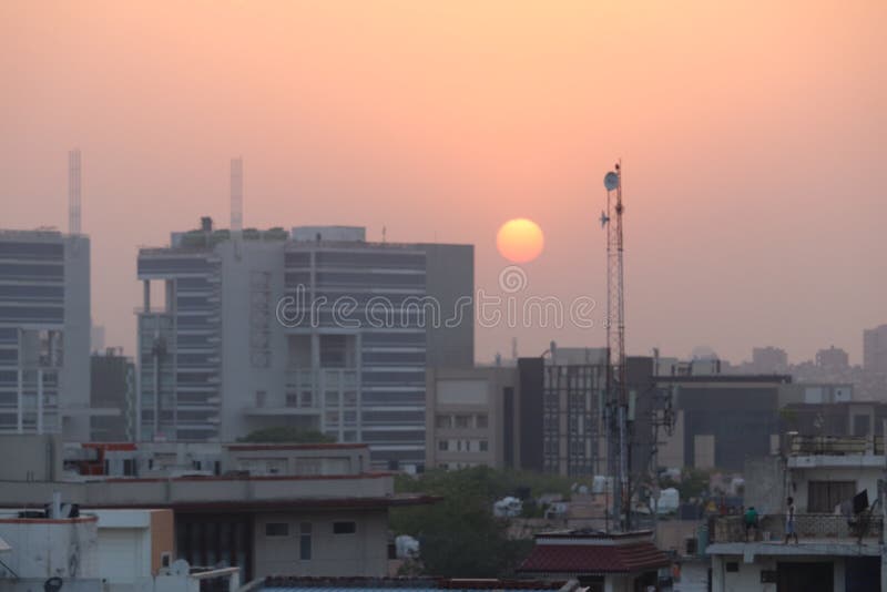 Sunset Over the Building with Luminous Power in New Delhi Stock Photo ...