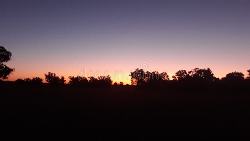 Sunset over bushland stock photo. Image of colours, landscape - 171947182