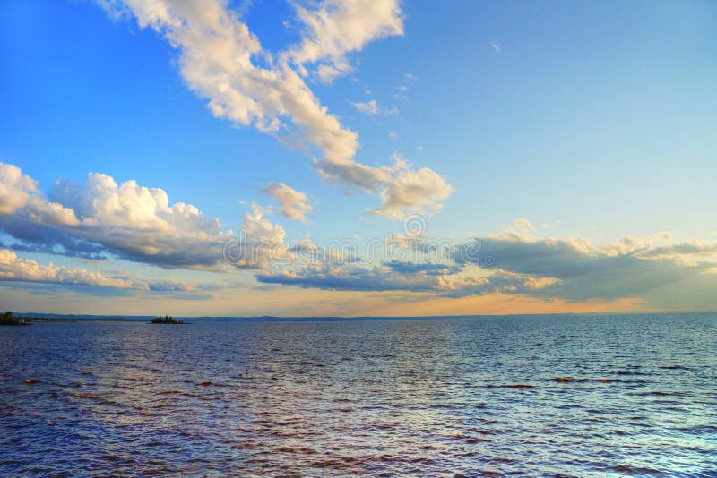 Sunset over calm lake stock photo. Image of lake, weather - 33147264