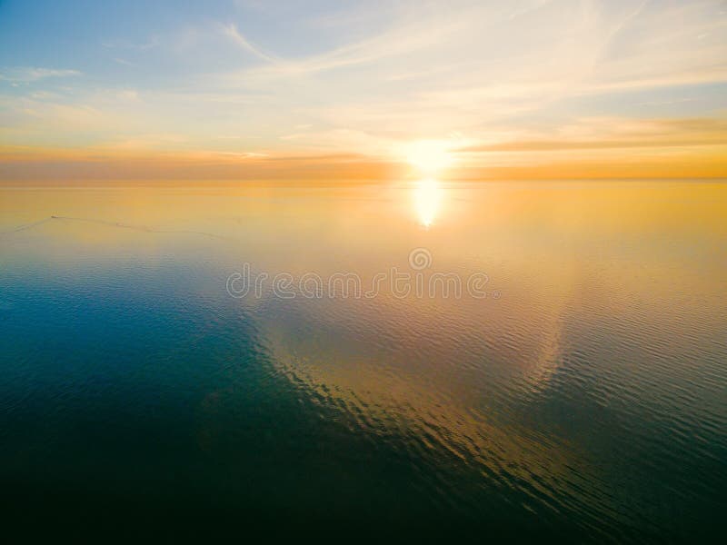 Sunset Over Calm Ocean Water. Stock Photo - Image of dramatic, panorama ...