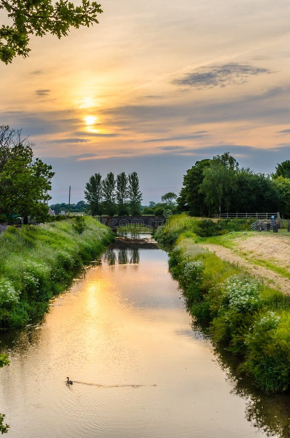 Sunset Over a Canal in the English Countryside Stock Image - Image of ...