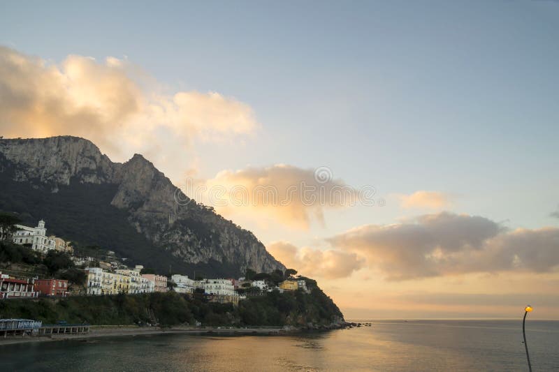 Sunset over Capri Island stock image. Image of night - 63357743
