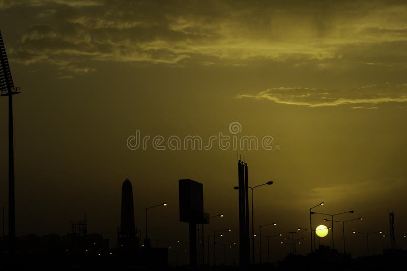 Sunset Over City with Buildings in Silhouette Stock Image - Image of ...