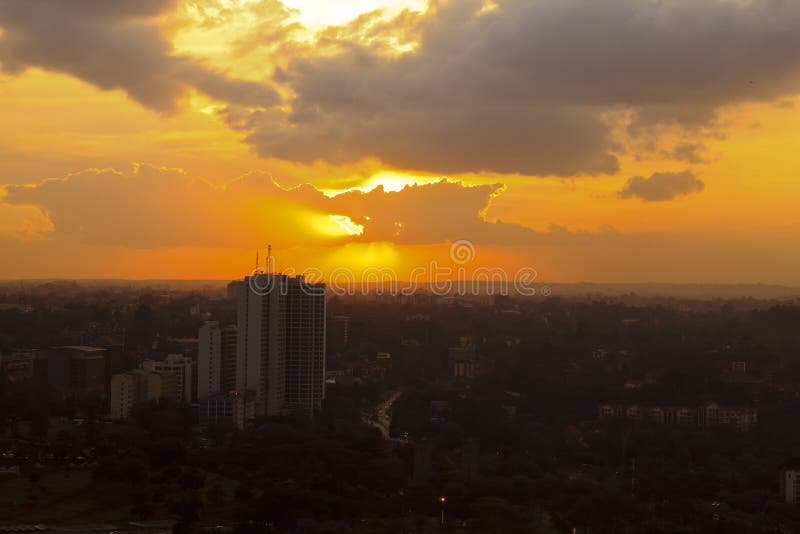 Sunset over a city stock photo. Image of sunlight, orange - 34067362