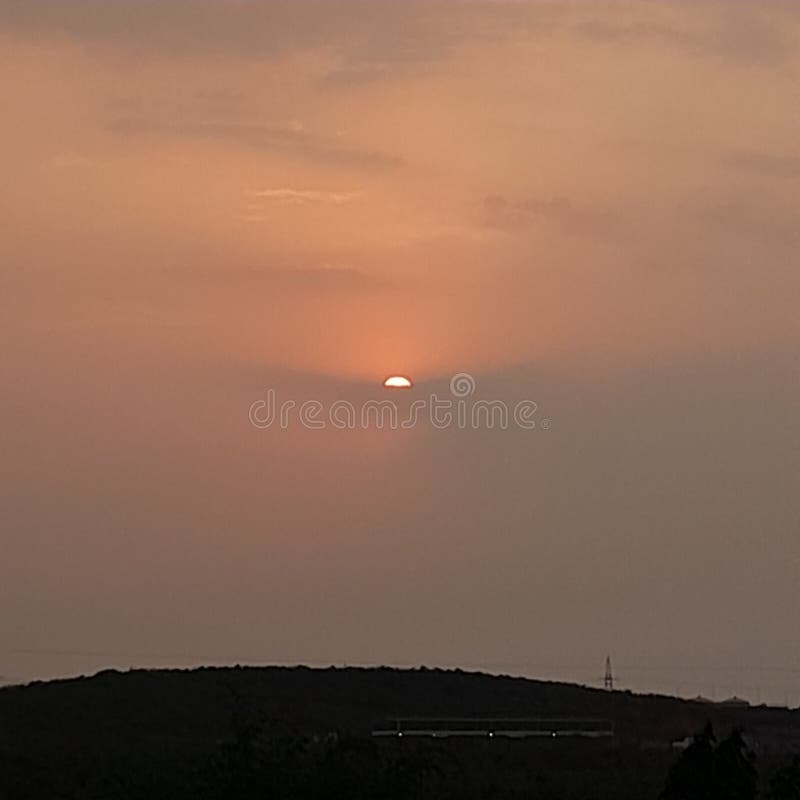 Sunset Over the Cloud with Half Sun Exposure Stock Photo - Image of ...