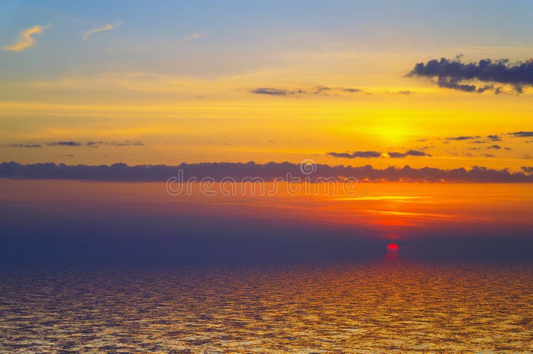 Sunset over cold ocean.2 stock photo. Image of plane - 27200852