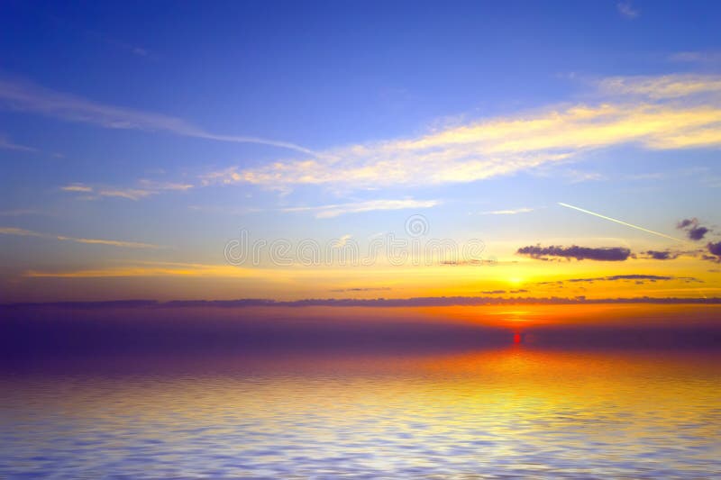 Sunset over cold ocean.2 stock photo. Image of plane - 27200852