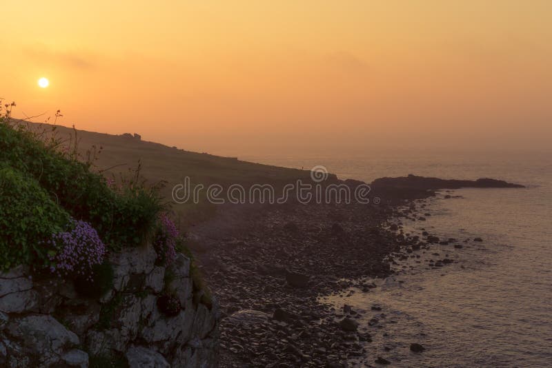 Sunset over Cornish coast stock photo. Image of ocean - 119726120