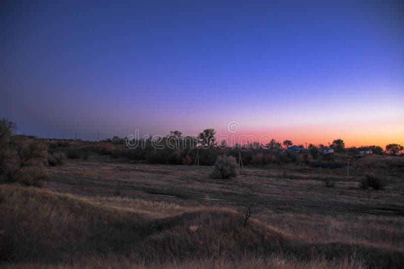 Sunset Over Country Field Picture. Image: 83009291