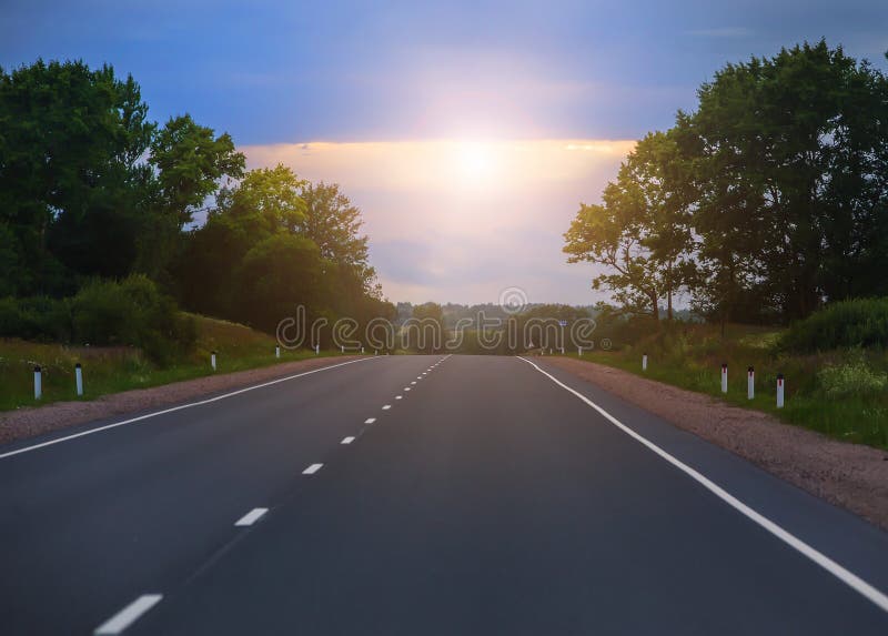 Sunset Over the Country Highway Stock Image - Image of highway, horizon ...