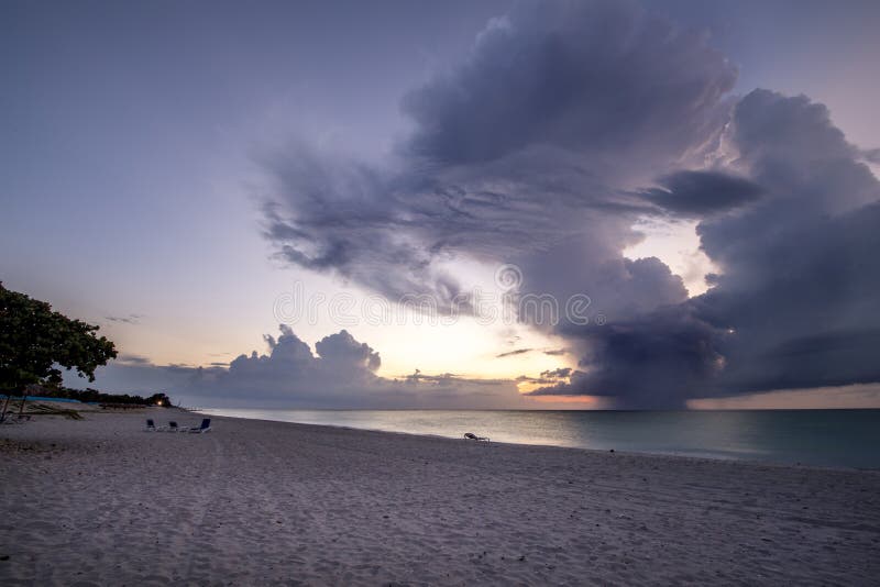 Sunset over Cuban beach stock image. Image of shore, cuba - 95713443
