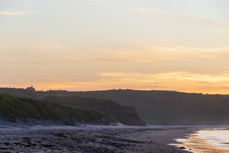 Sunset Over Cullen Bay in a Clear Evening Stock Image - Image of hill ...