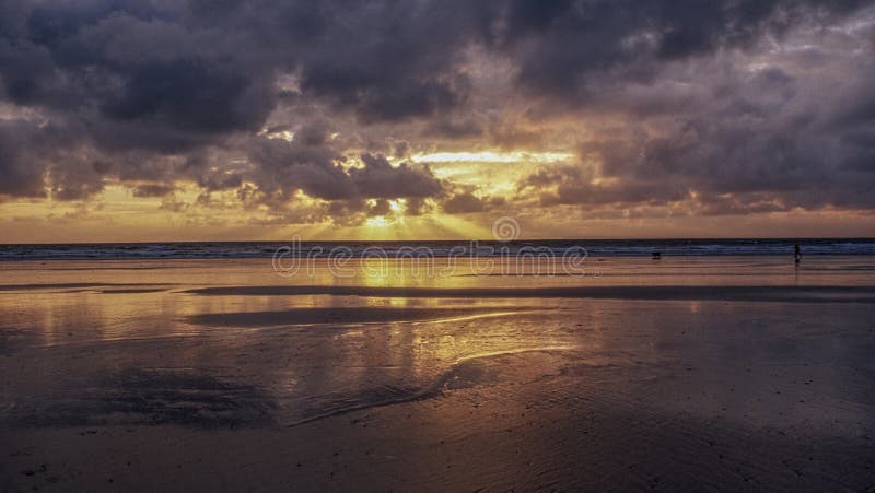 Sunset over Devon Beach stock image. Image of sand, colour - 118921939