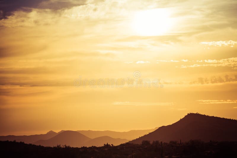 A Sunset Over a Distant Mountain Stock Image - Image of cloud, cactus ...