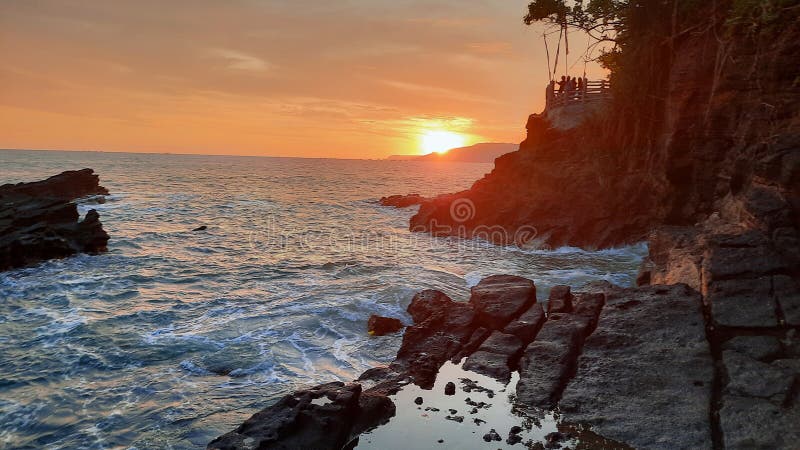 Sunset Over the Edge of the Cliff with Choppy Sea Stock Image - Image ...