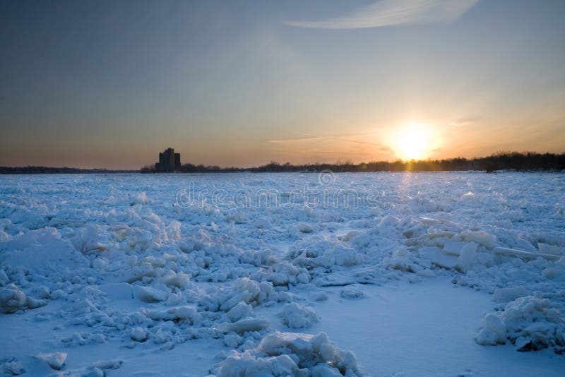 Sunset over frozen river stock photo. Image of montreal - 1873362