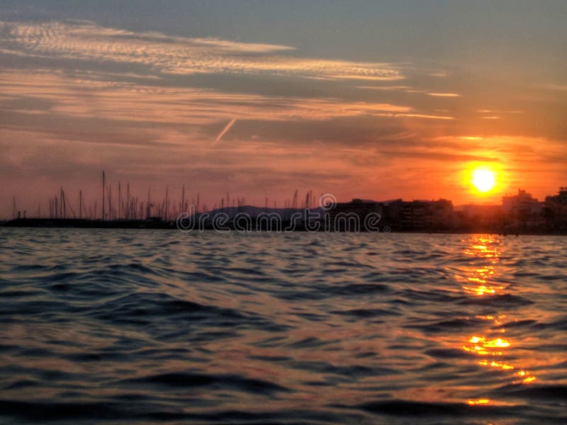 Sunset over the harbour stock image. Image of port, sunset - 130908969