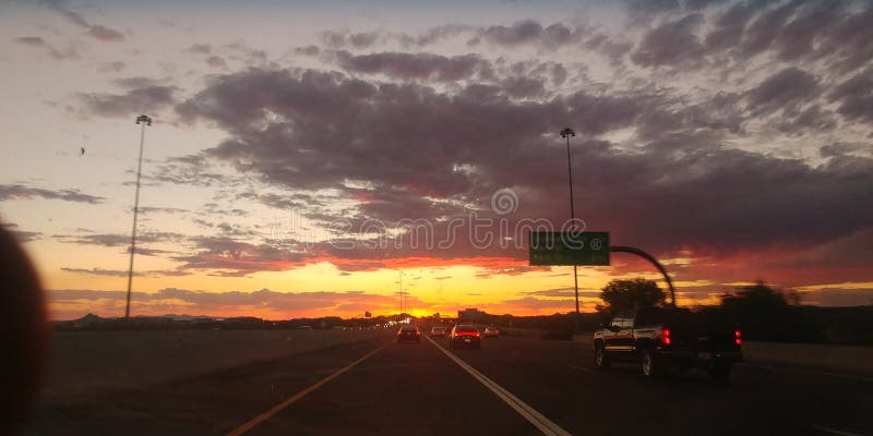 Sunset over highway editorial image. Image of sunset - 100761385