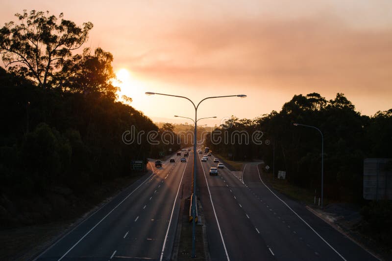 Sunset over highway stock image. Image of trip, highway - 70762499