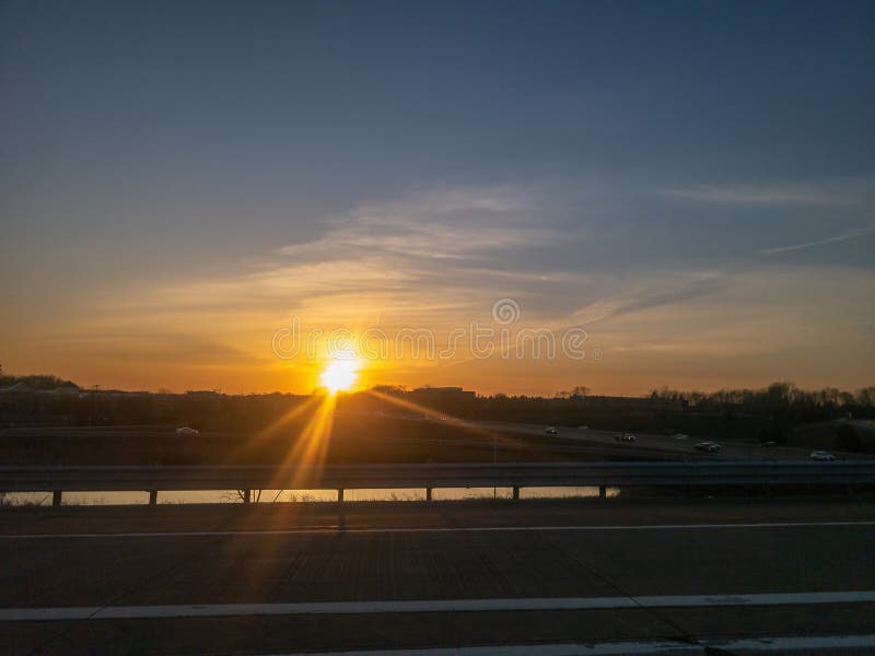 Sunset over the highway stock image. Image of outdoor - 275375643