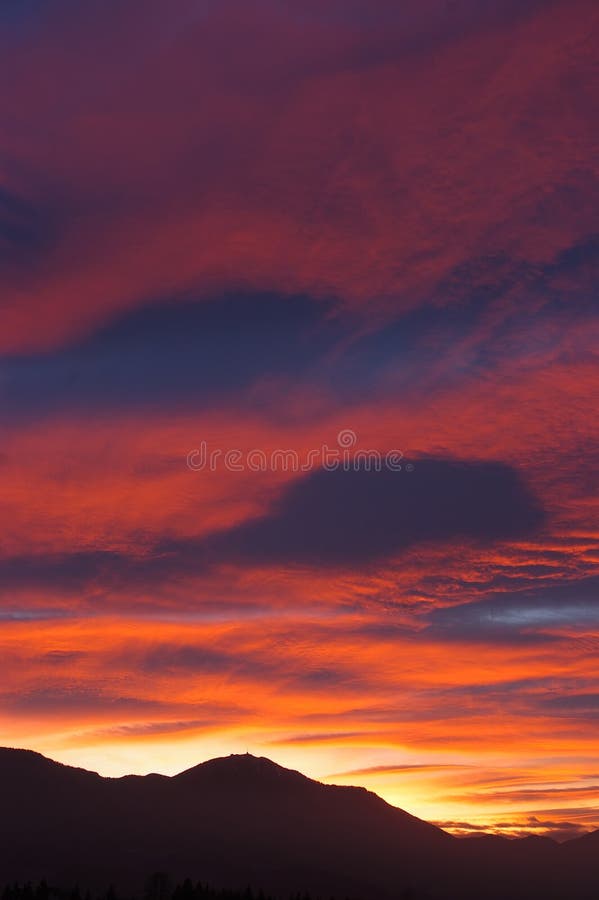 Sunset over hills stock image. Image of yellow, orange - 1803063