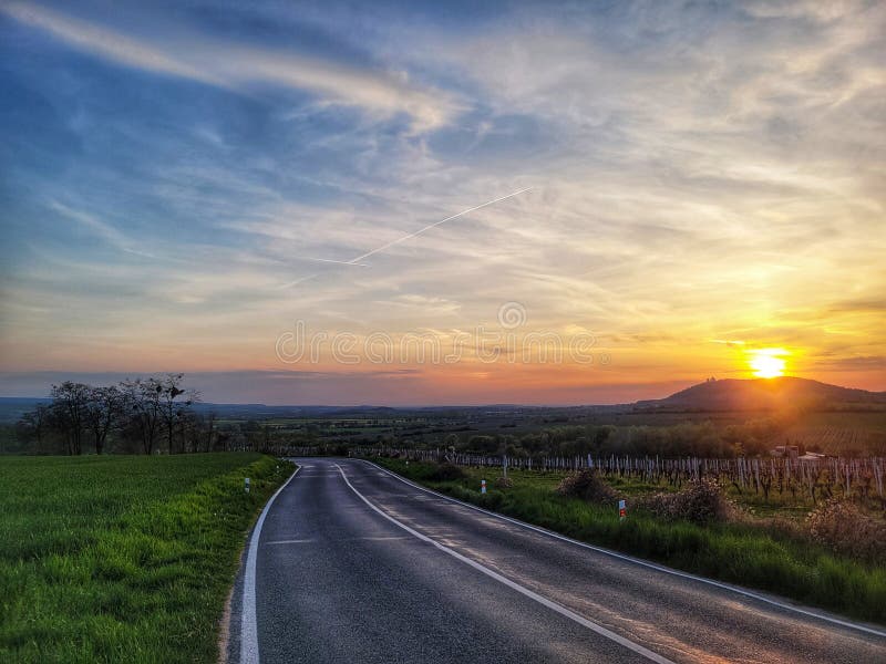 Sunset over the hills stock image. Image of road, nature - 253158953