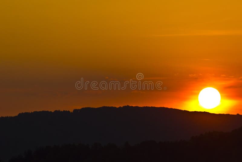 Sunset over hills stock photo. Image of autumn, hills - 58641758