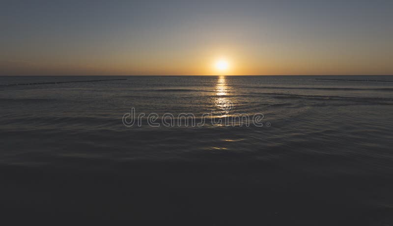 Sunset Over the Horizon of the Ocean Stock Image - Image of scenic ...