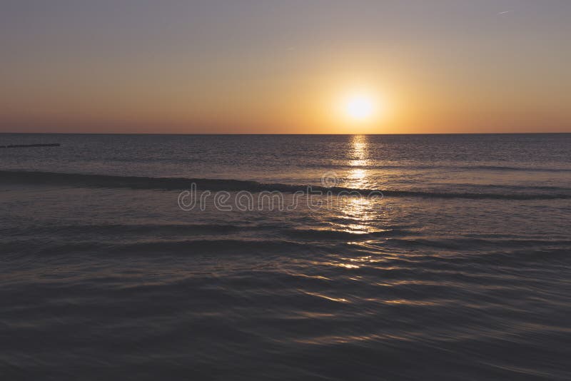 Sunset Over the Horizon of the Ocean Stock Image - Image of beautiful ...