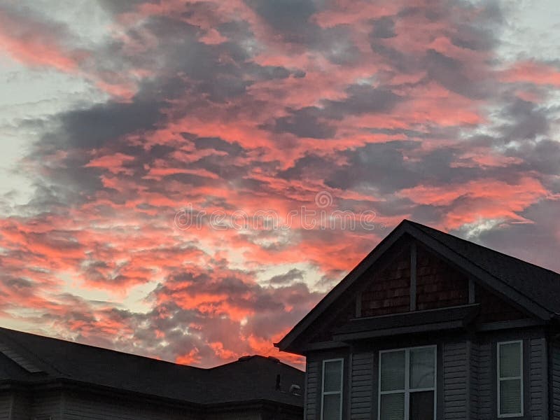 Sunset over a house stock image. Image of house, city - 221987455