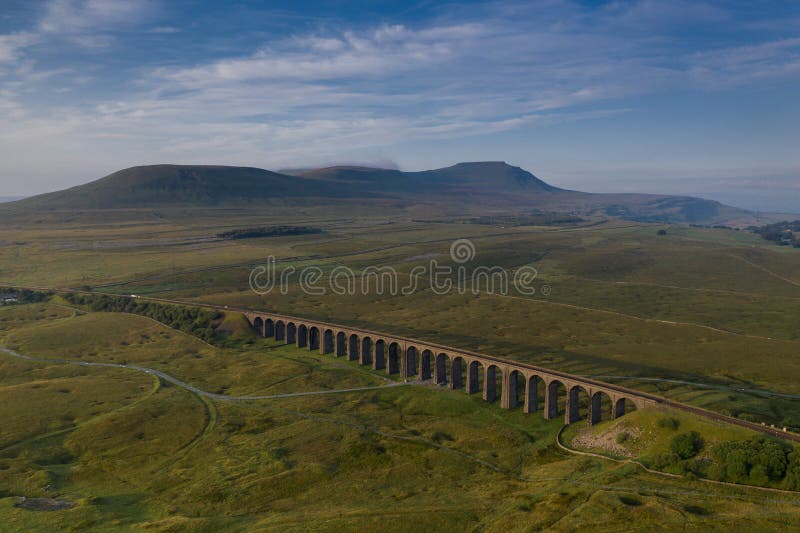 An Old Iconic Viaduct Bridge Spans a Snowy Winter River Stock Photo ...