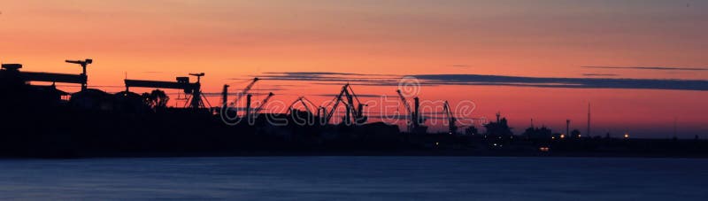 Sunset Over Industrial Port Stock Photo - Image of industrial, outdoors ...