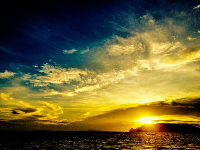 Sunset over island stock photo. Image of color, colored - 38168124