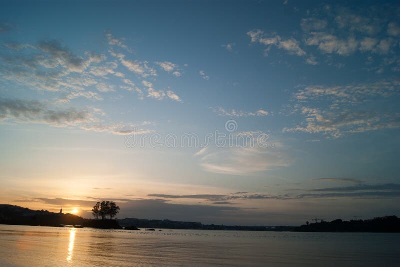 Sunset Over Island in the River Stock Photo - Image of sunset, scene ...
