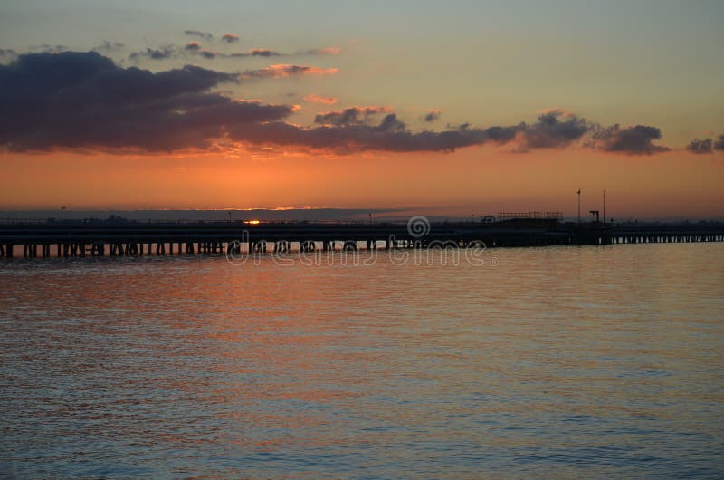Sunset over Jetty stock photo. Image of peaceful, view - 61735244